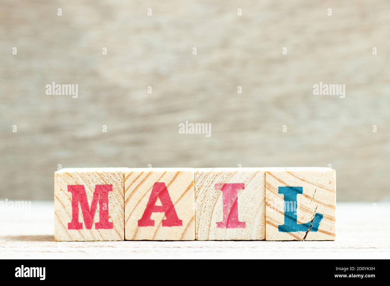 Alphabet letter in word mail on wood background Stock Photo - Alamy
