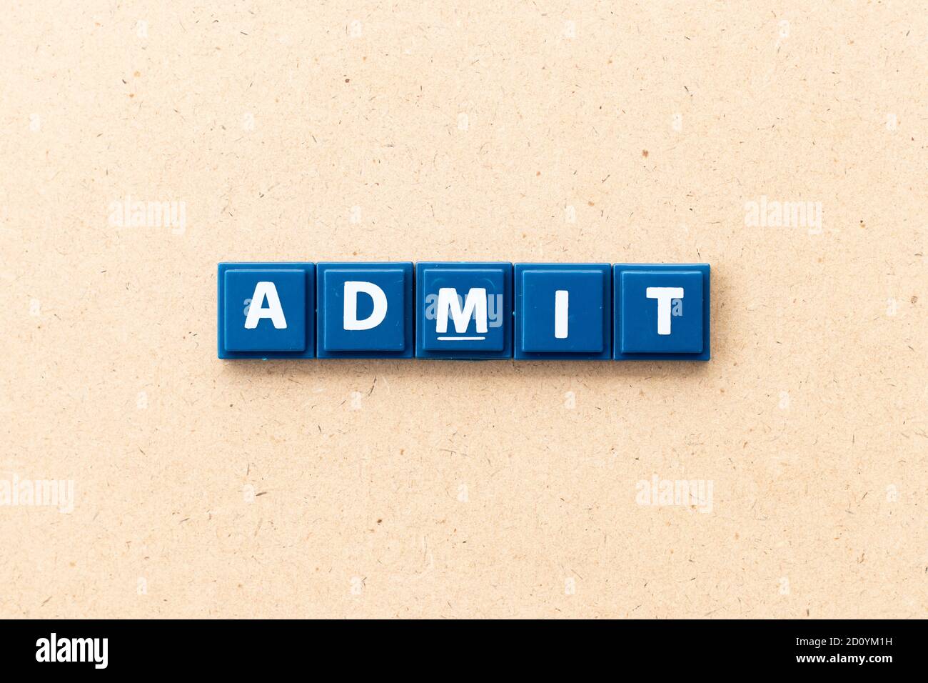 Tile letter in word admit on wood background Stock Photo - Alamy