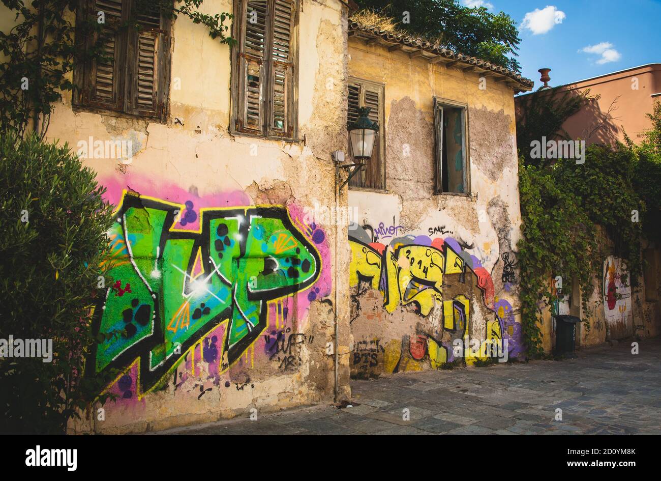 Greek graffiti in an alley in Athens, Greece Stock Photo - Alamy
