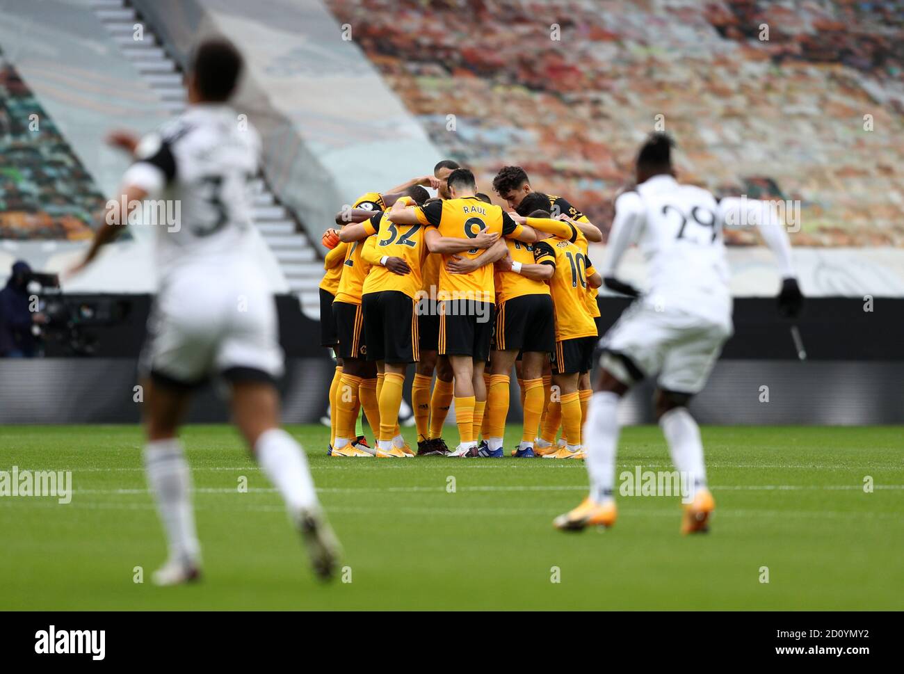 Wolverhampton Wanderers players huddle before the Premier League match ...