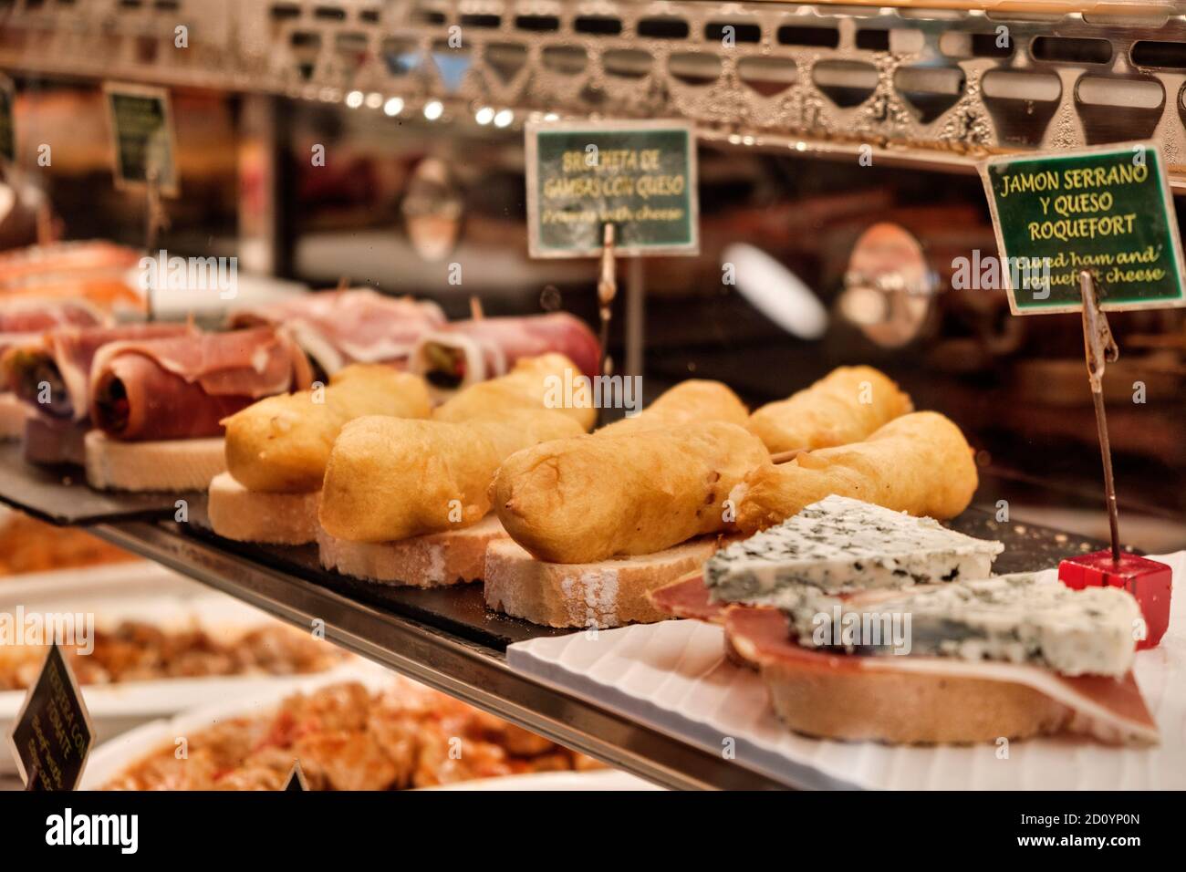 Tapas on display at the counter of tapas bar "Cava Aragonesa" in Calle ...