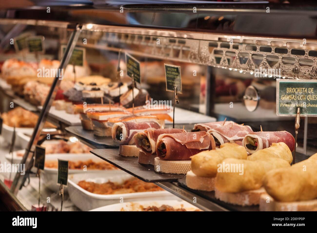 Tapas on display at the counter of tapas bar "Cava Aragonesa" in Calle ...
