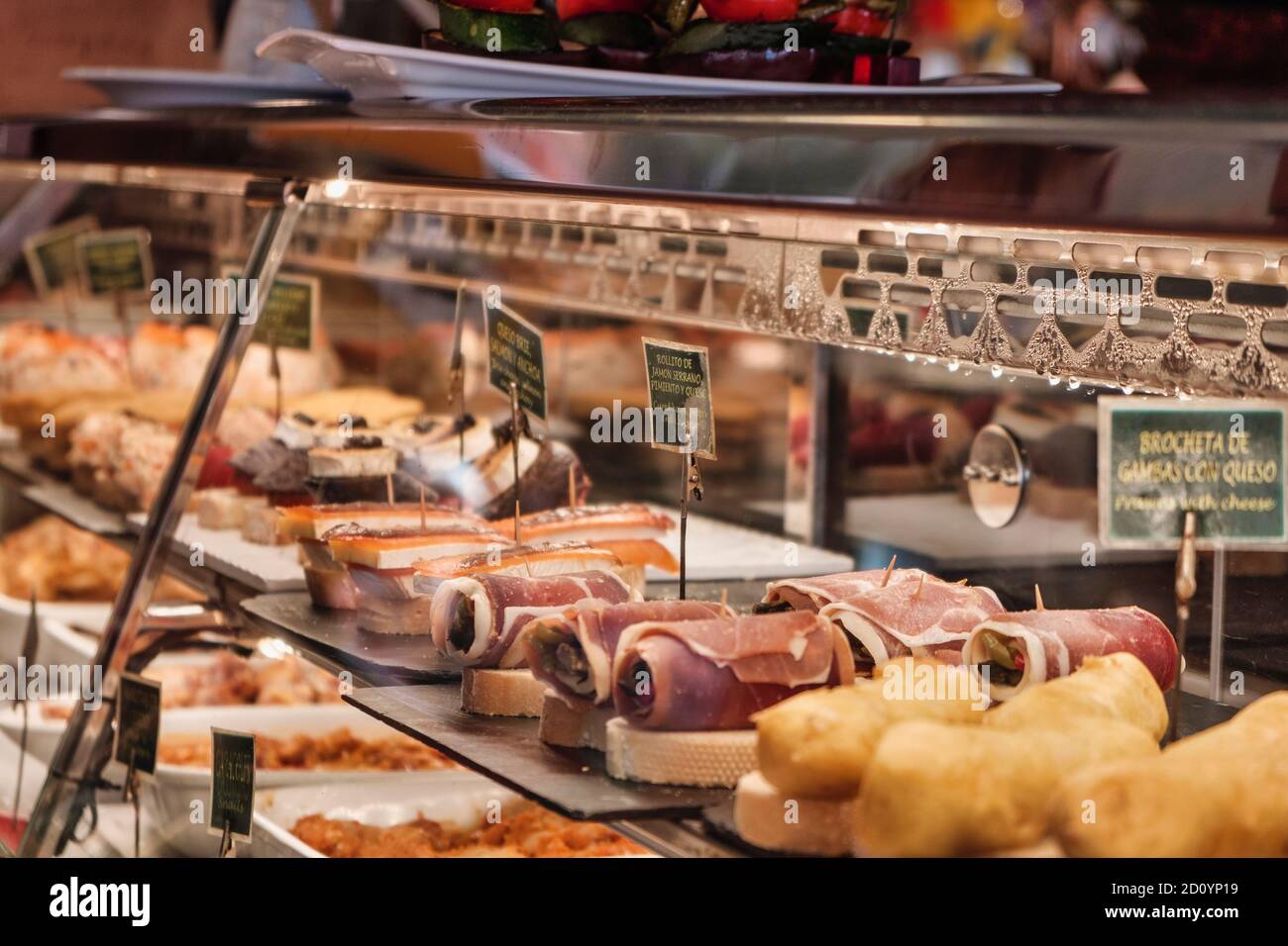 Tapas on display at the counter of tapas bar "Cava Aragonesa" in Calle ...