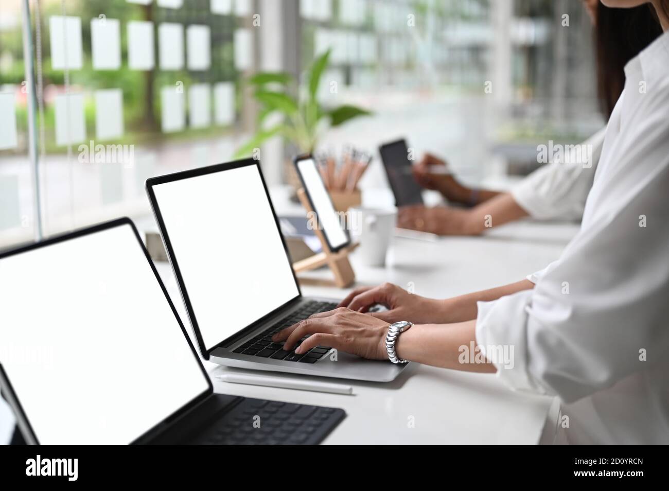 UX UI front end designers drawing responsive web content empty screen ...