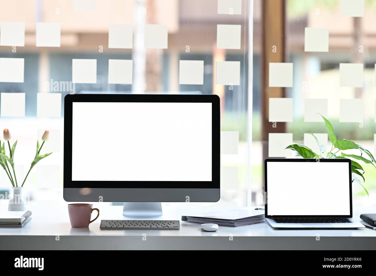 Comfortable workspace is computer monitor and various equipment Stock ...