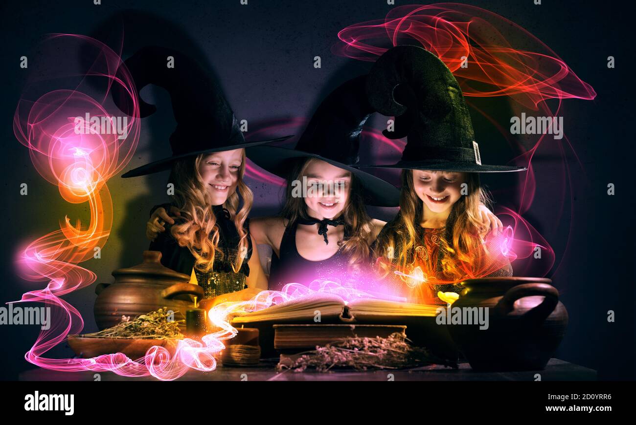 Three little witches Stock Photo - Alamy