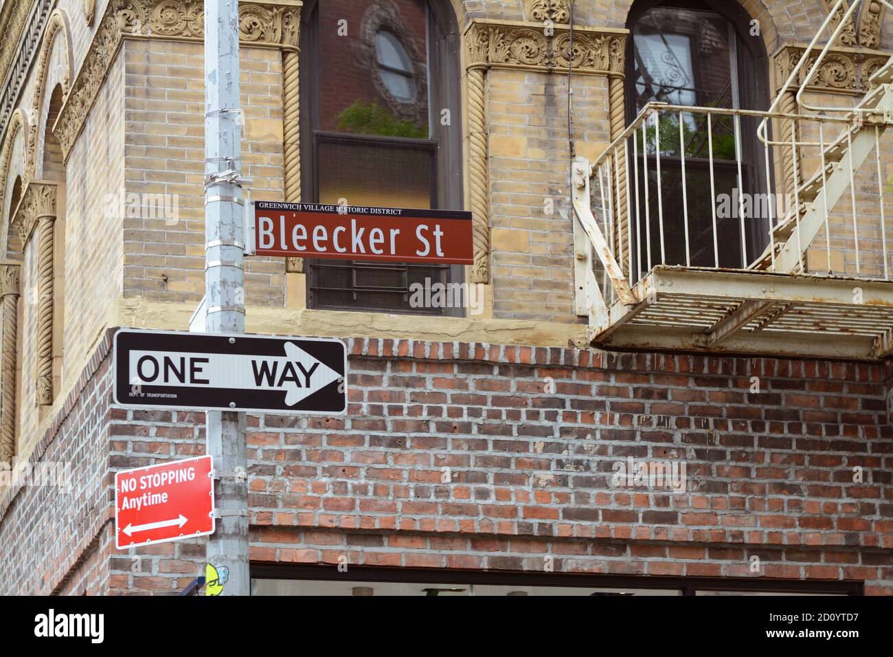Street sign for Bleecker Street on the corner with Grove Street in New ...