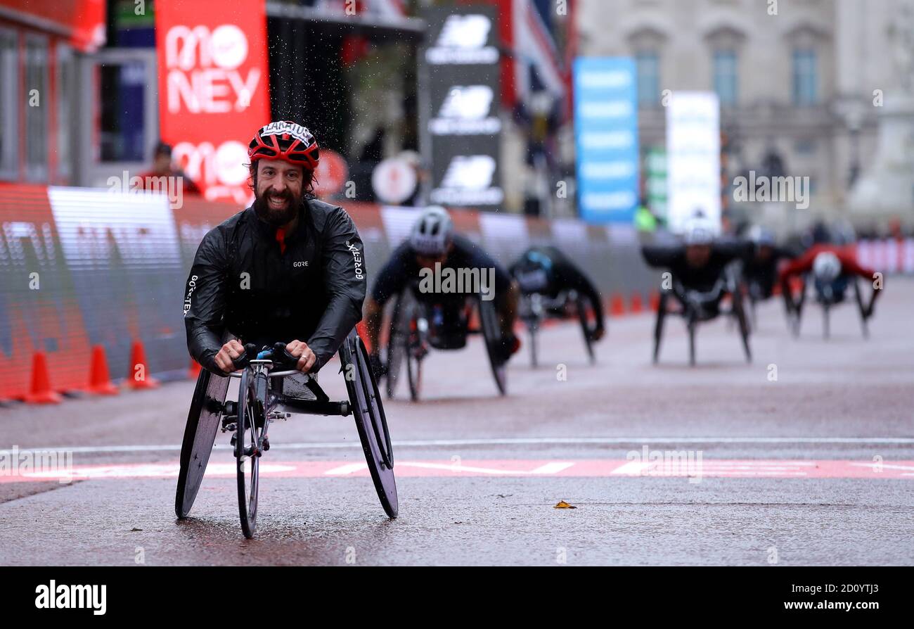 Canada's Brent Lakatos wins the Elite Wheelchair Race during the Virgin ...