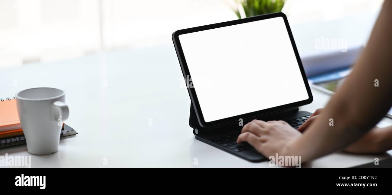 Mockup image of business woman working with computer tablet on white ...