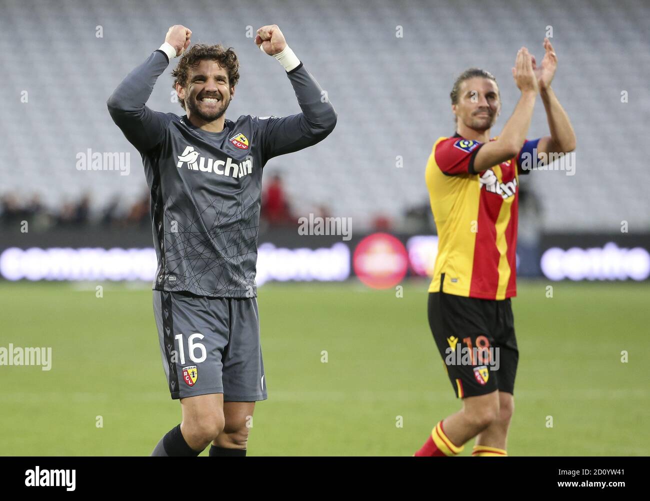 Goalkeeper of Lens Jean-Louis Leca, Yannick Cahuzac of Lens celebrate ...