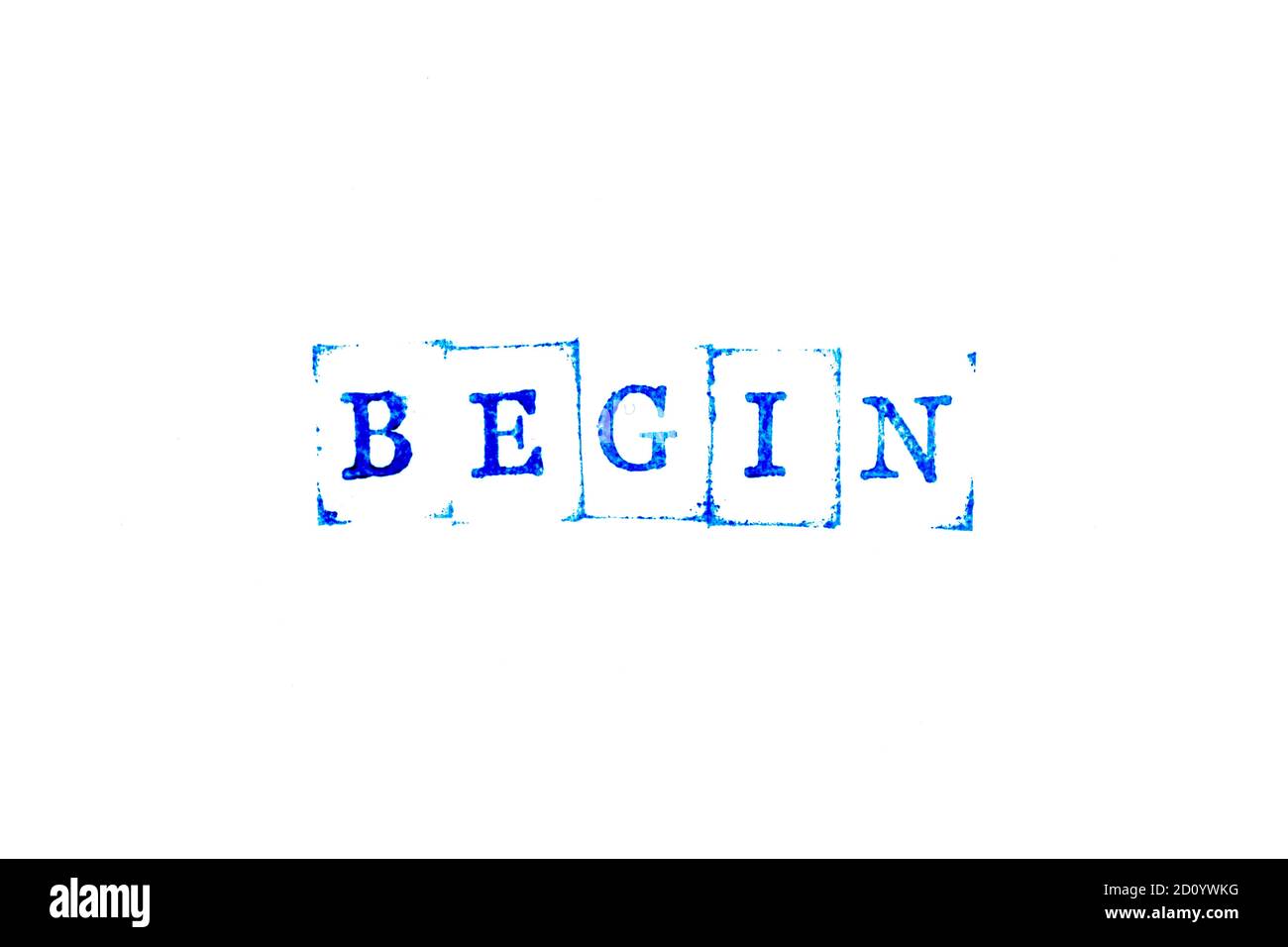 Blue color ink of rubber stamp in word begin on white paper background ...