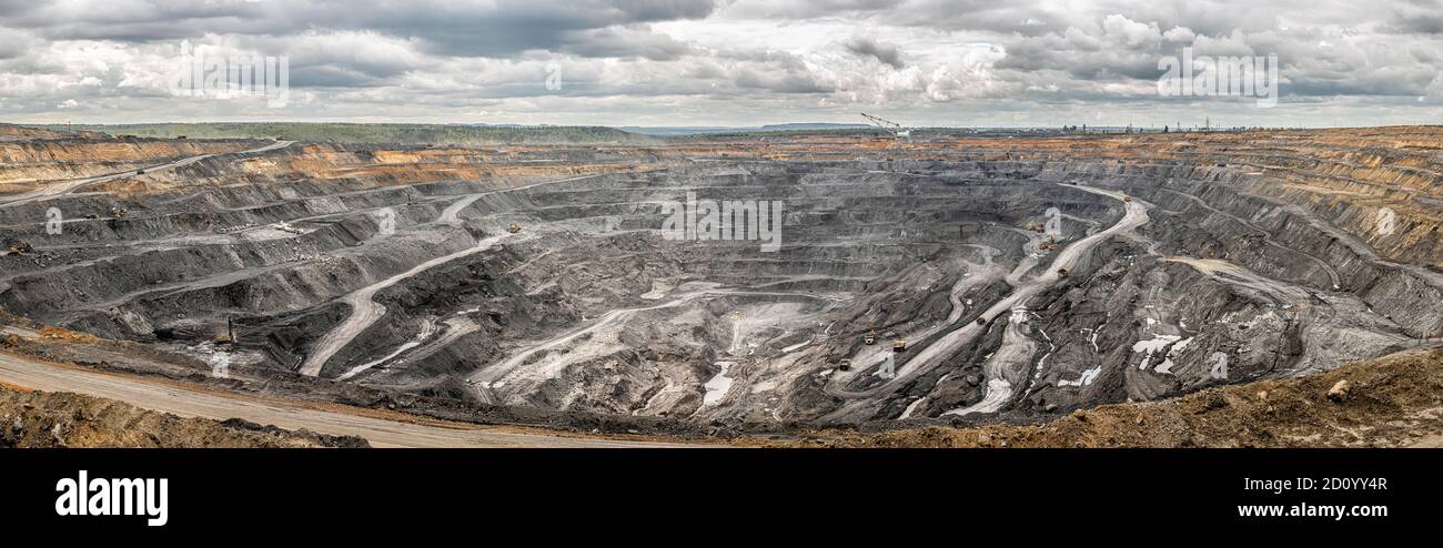 Panoramic aerial view of coal mine. Open pit mine industry, big yellow ...