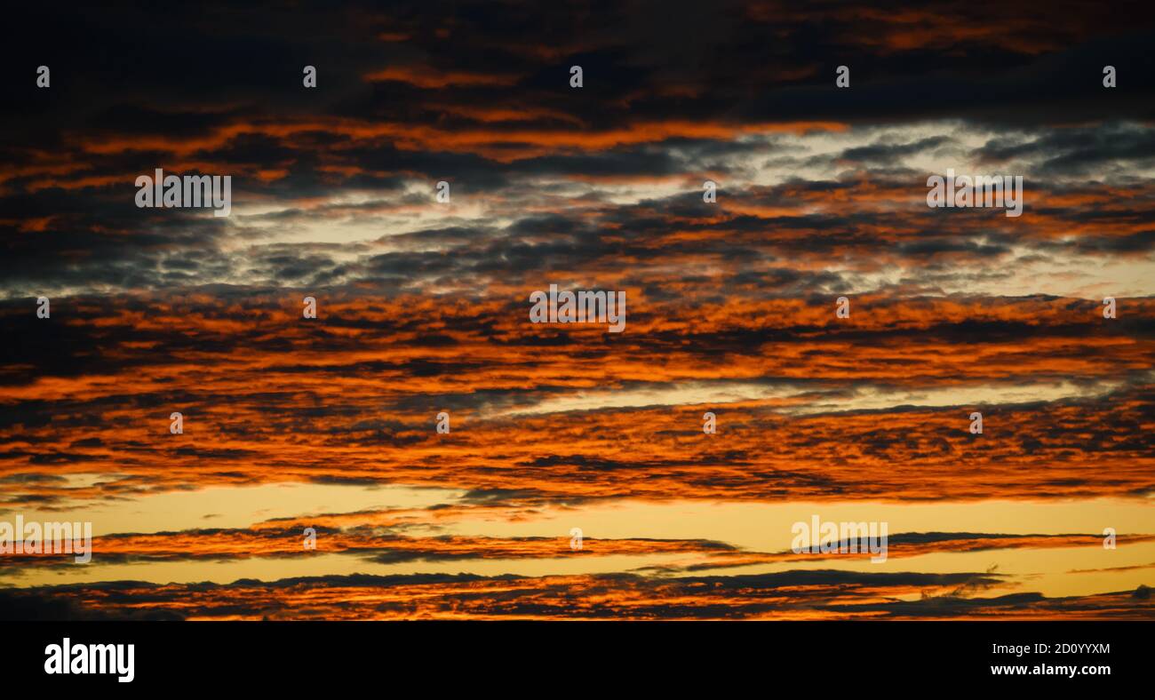 Beautiful and warm colored sunset sky Stock Photo - Alamy