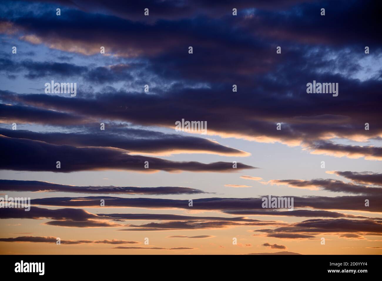 Beautiful and warm colored sunset sky Stock Photo - Alamy