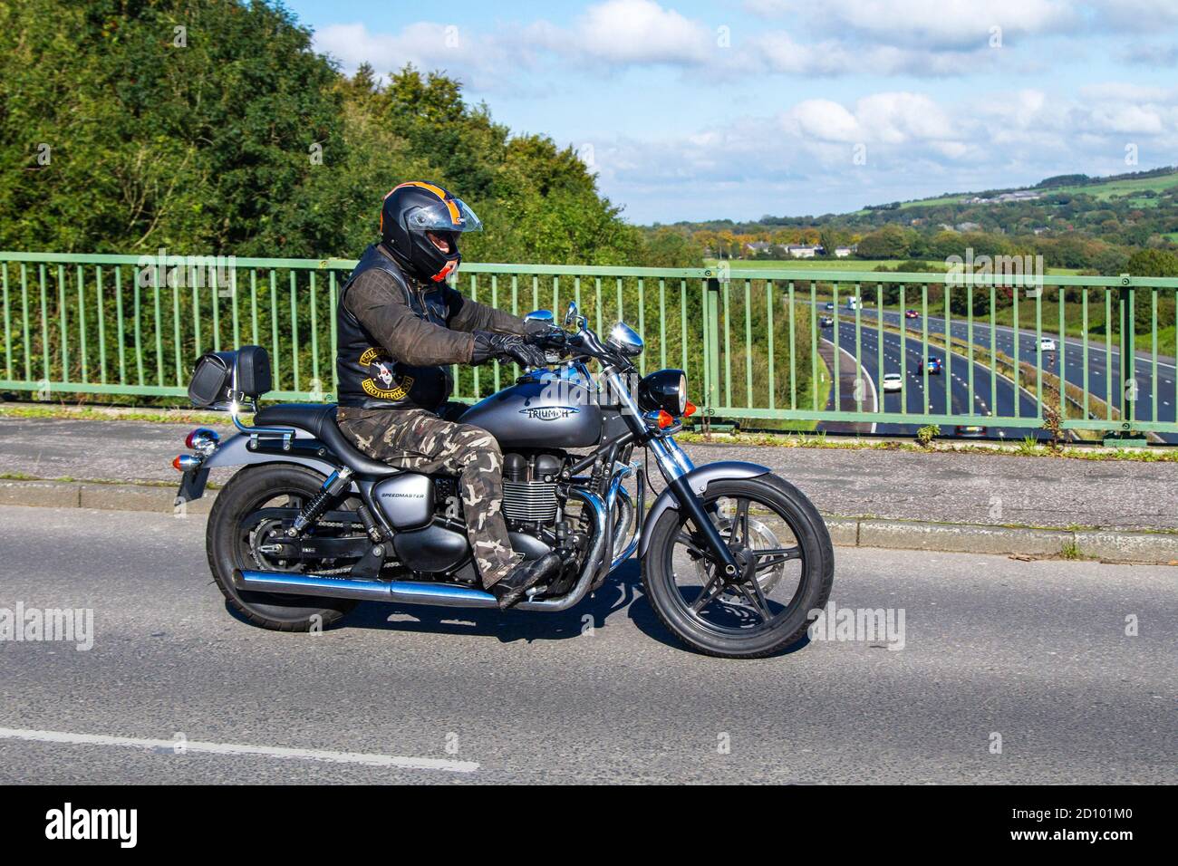 Triumph Speedmaster, Triumph cruiser motorcycle; Motorbike rider; two ...