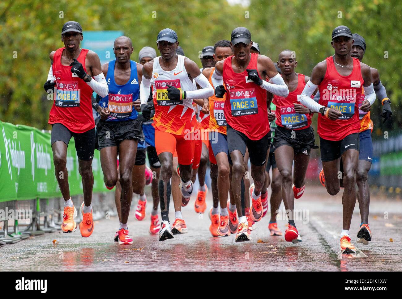 London, Britain. 4th Oct, 2020. Eliud Kipchoge (3rd L, Front) of Kenya ...