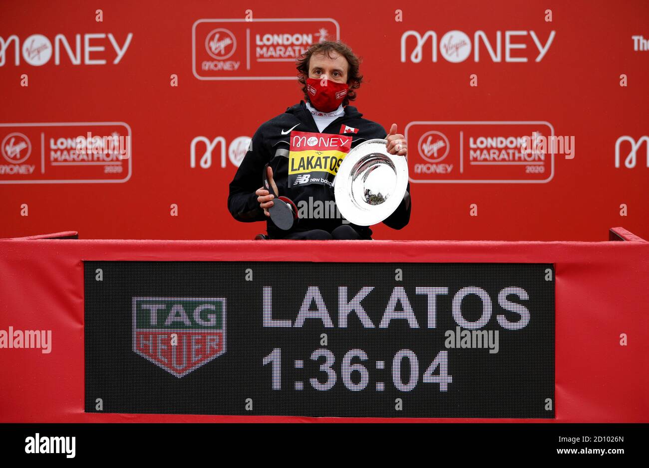 Canada's Brent Lakatos celebrates on the podium after winning the Elite ...