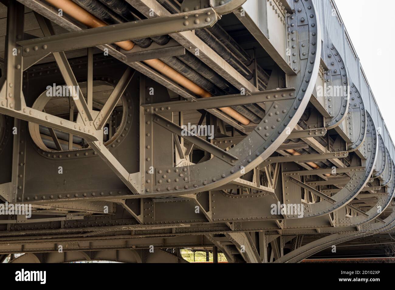 Underneath an old steel rail bridge - old construction in Germany Stock ...