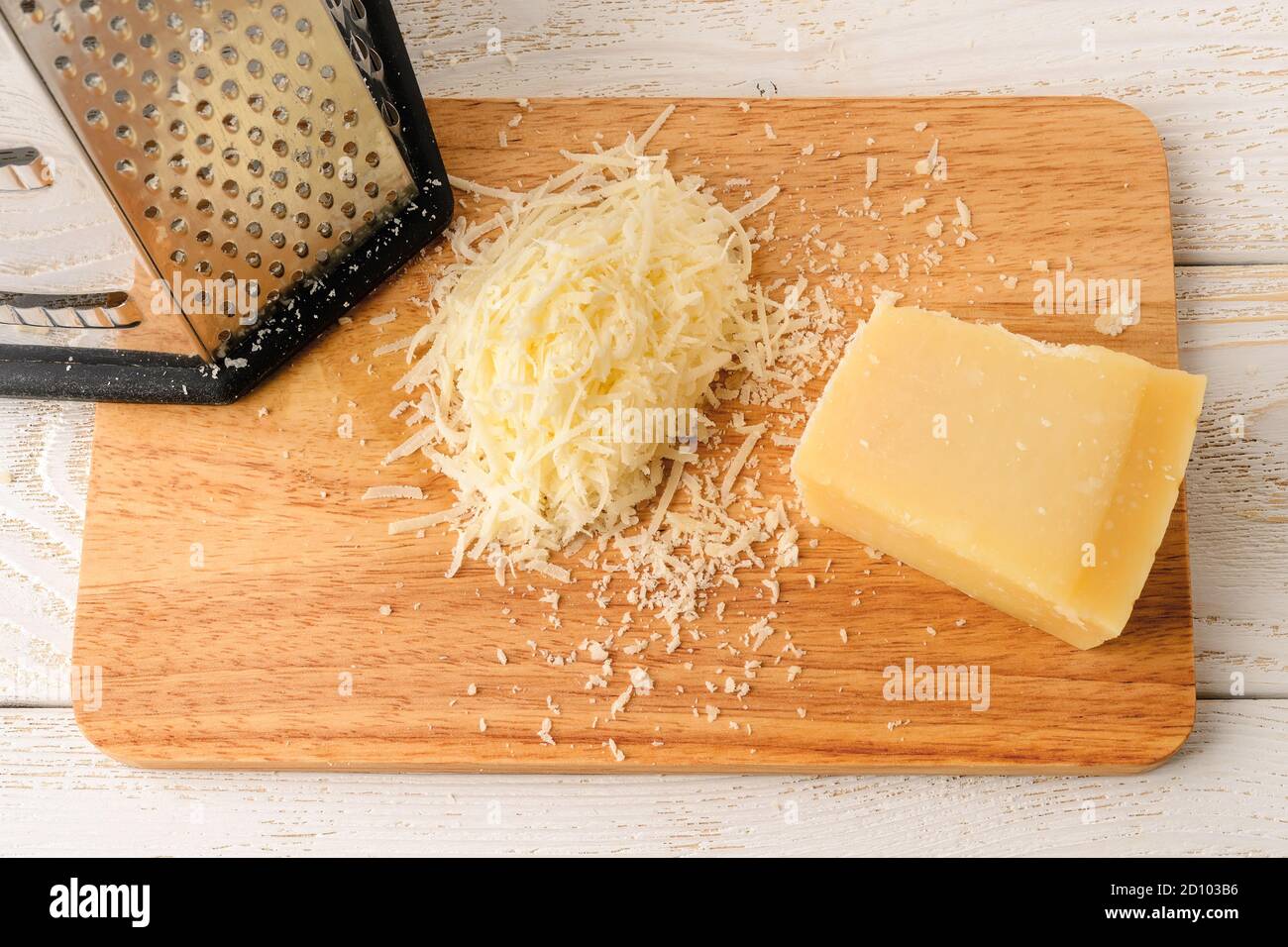 Wedge of traditional italian hard cheese Grana Padano or Parmesan ...