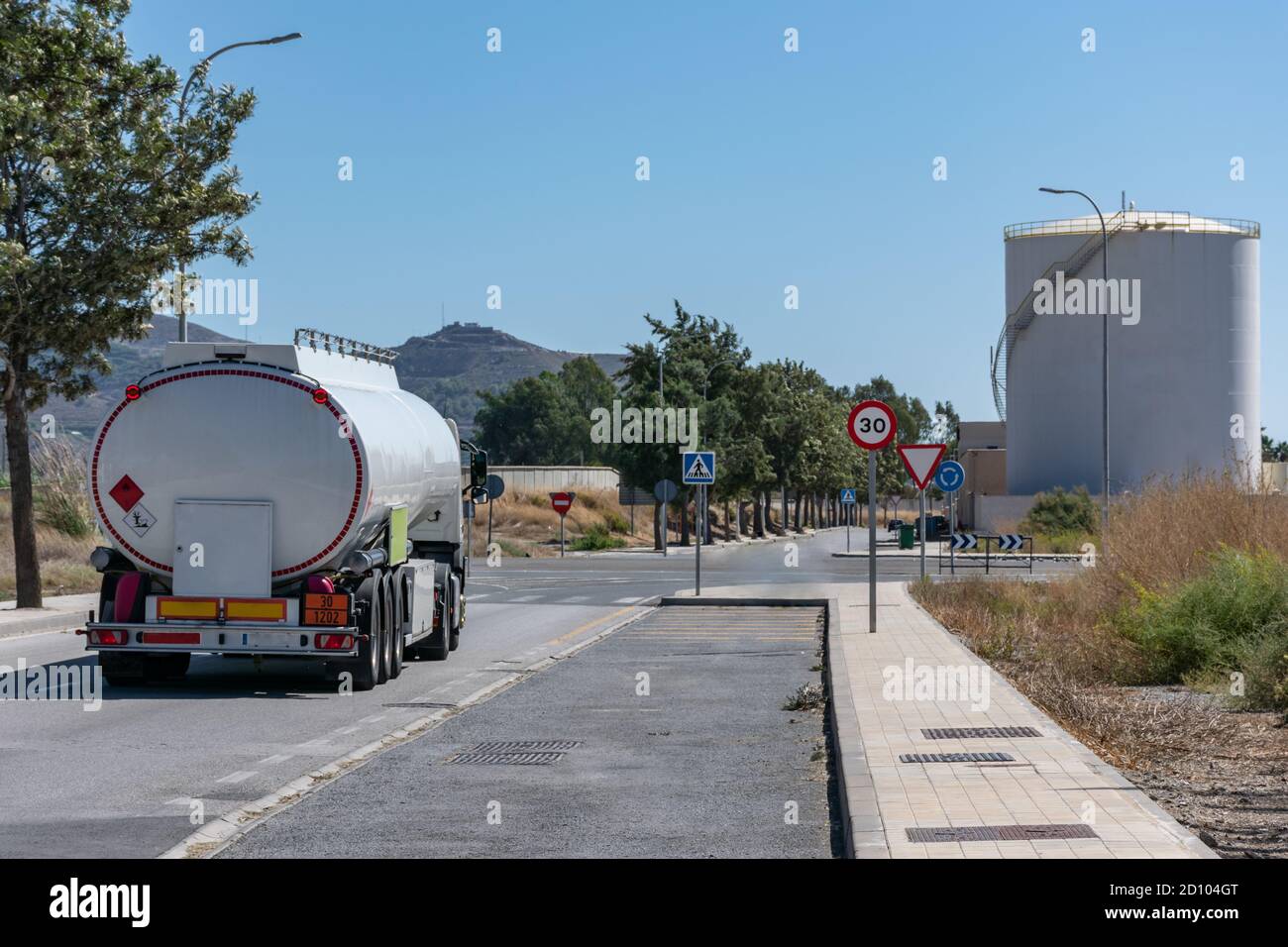 Fuel tanker next to the storage tanks where the product to be ...