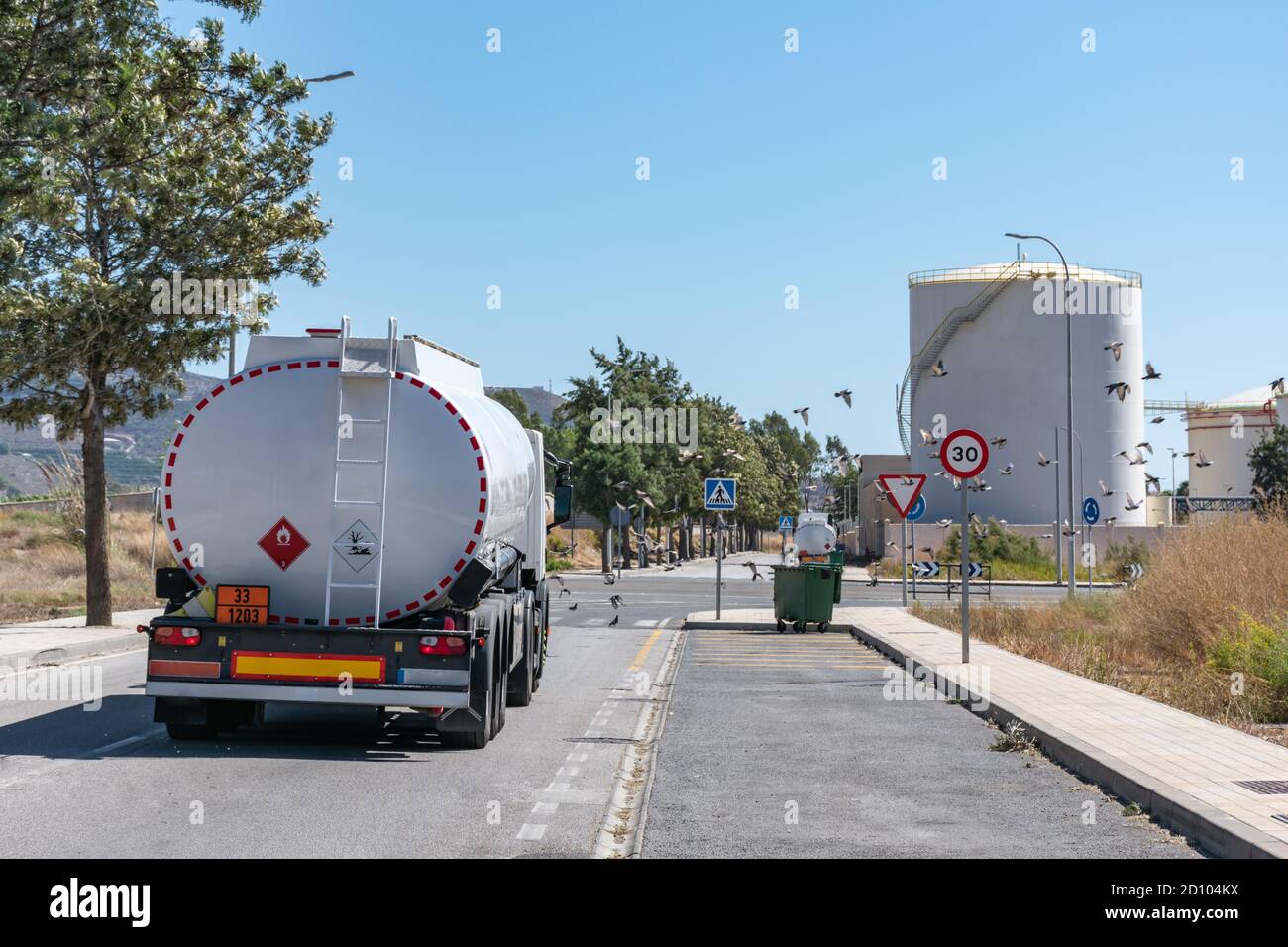 Fuel tanker next to the storage tanks where the product to be ...