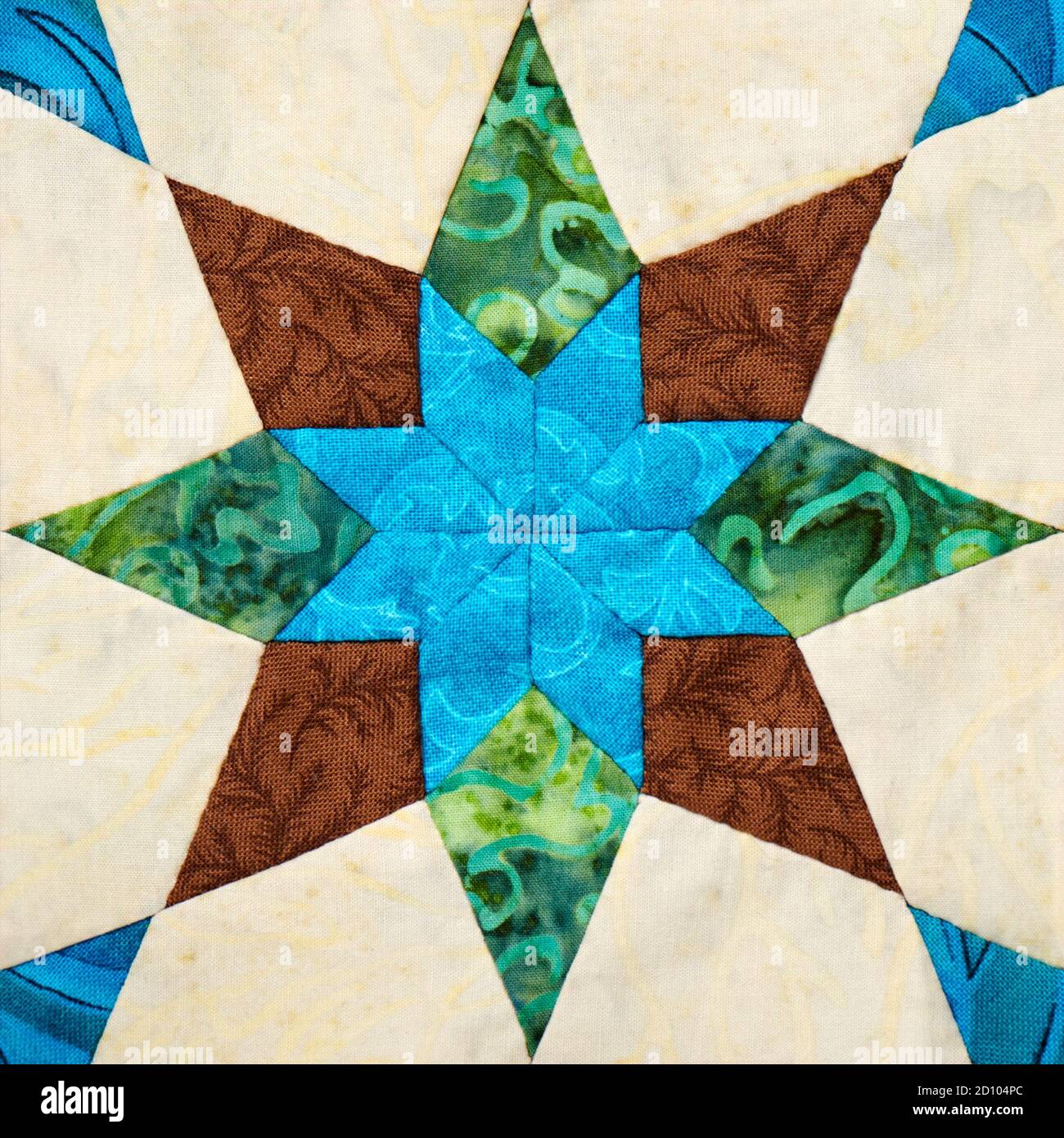 Detail of the quilt from pieces of fabric Stock Photo - Alamy