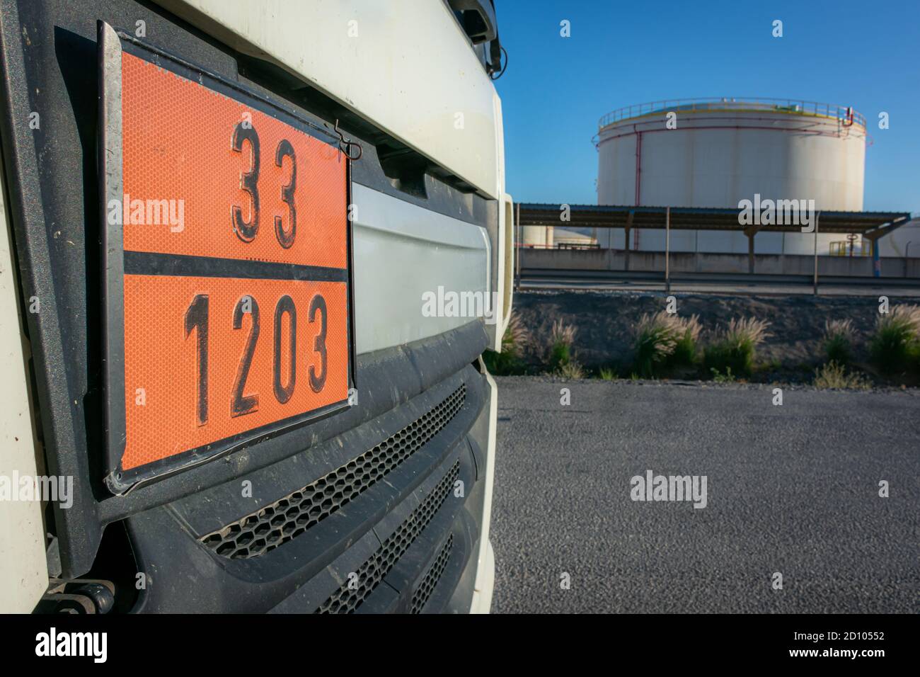 Orange panel with the indicative numbers of the danger in a tank truck ...