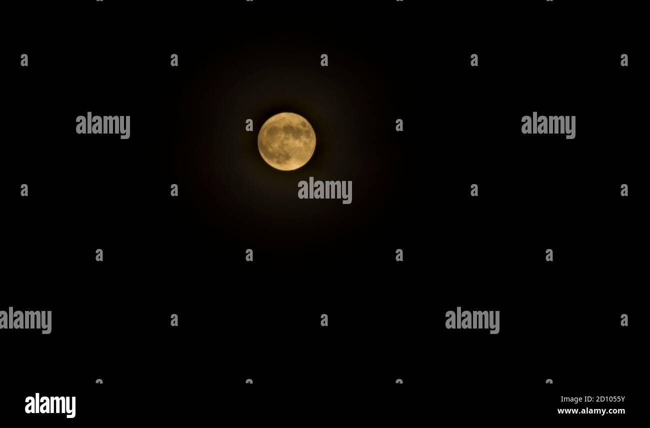 yellow full moon and foggy Stock Photo - Alamy