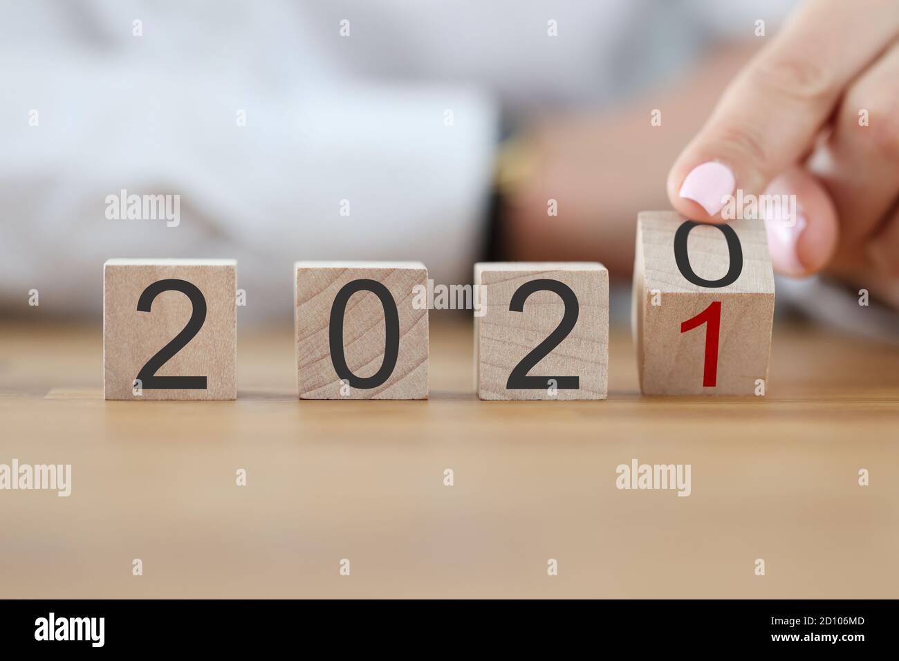 Female hand turn number 2020 into number 2021 with her finger Stock ...