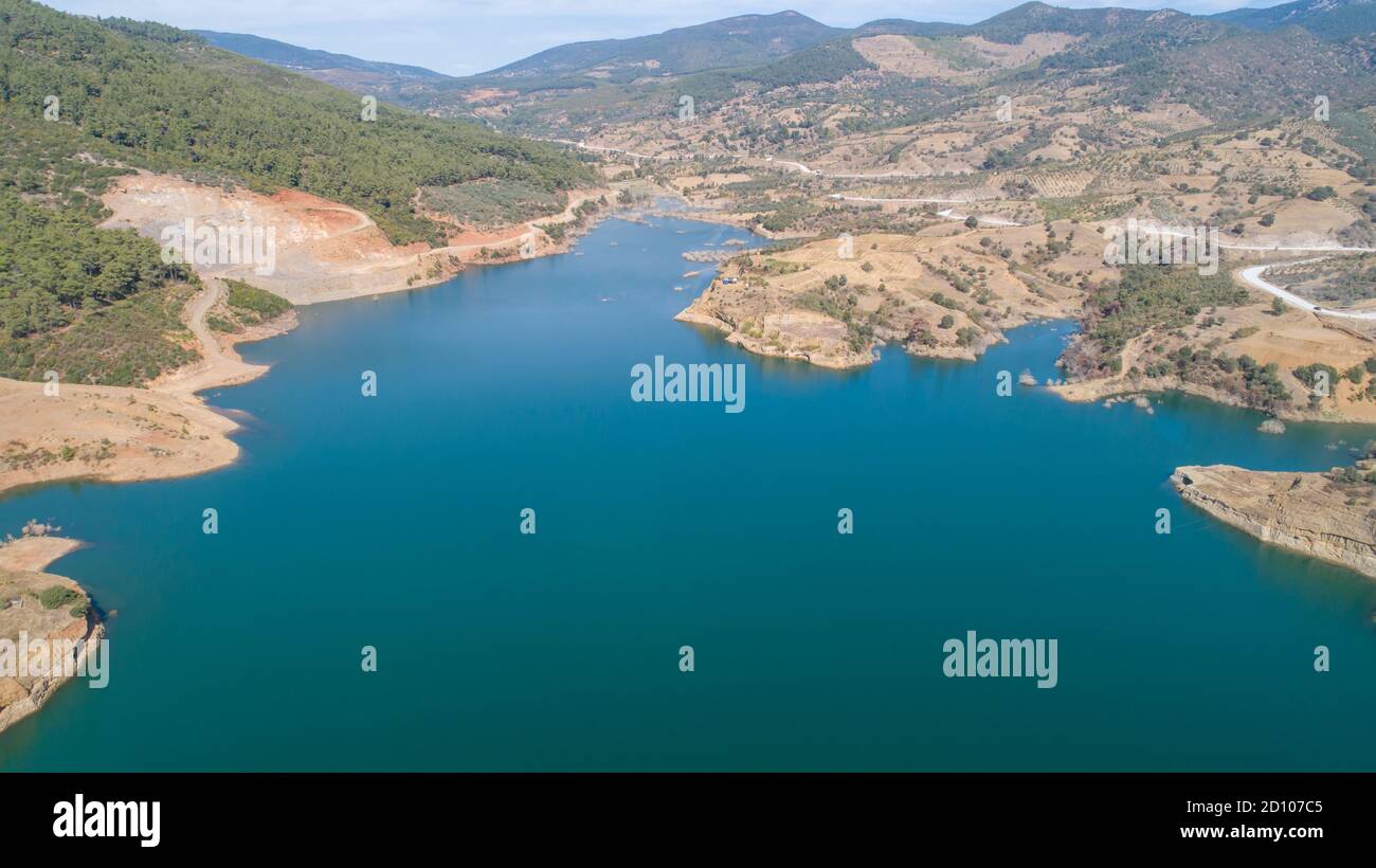 Aerial view of blue lake and green forest Stock Photo - Alamy