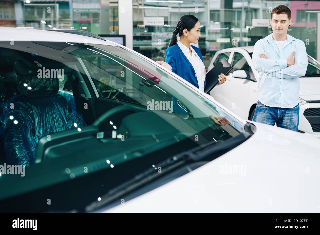Offering test drive to customer Stock Photo - Alamy