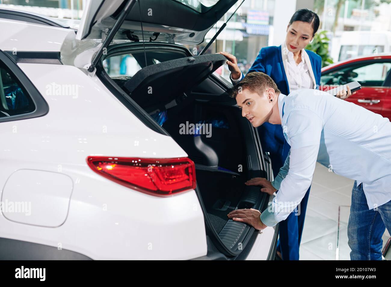 Looking inside car trunk Stock Photo - Alamy
