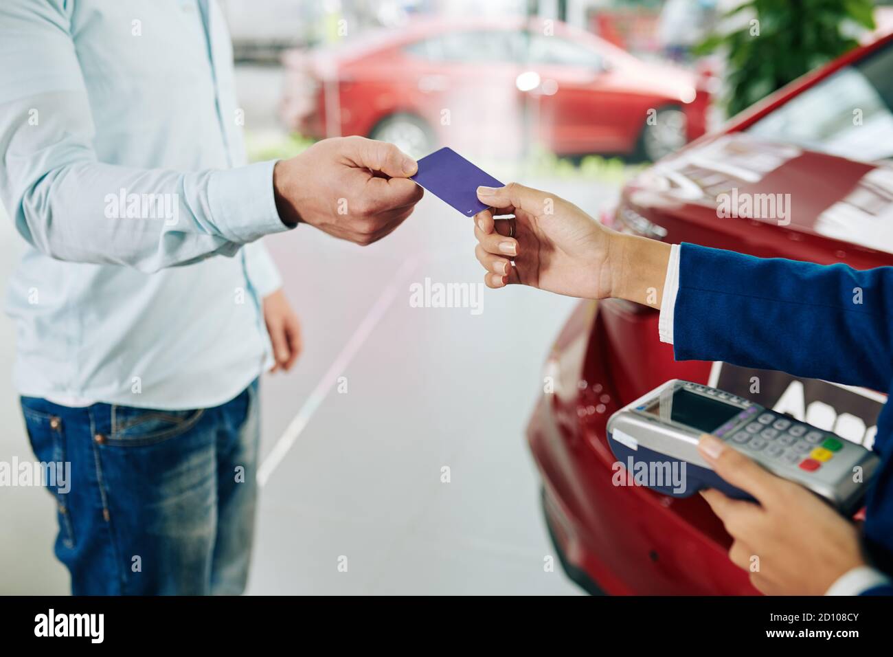 Paying for rental car Stock Photo - Alamy