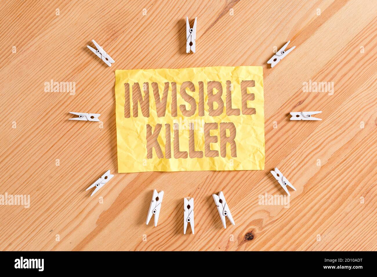 Writing note showing Invisible Killer. Business concept for presence ...