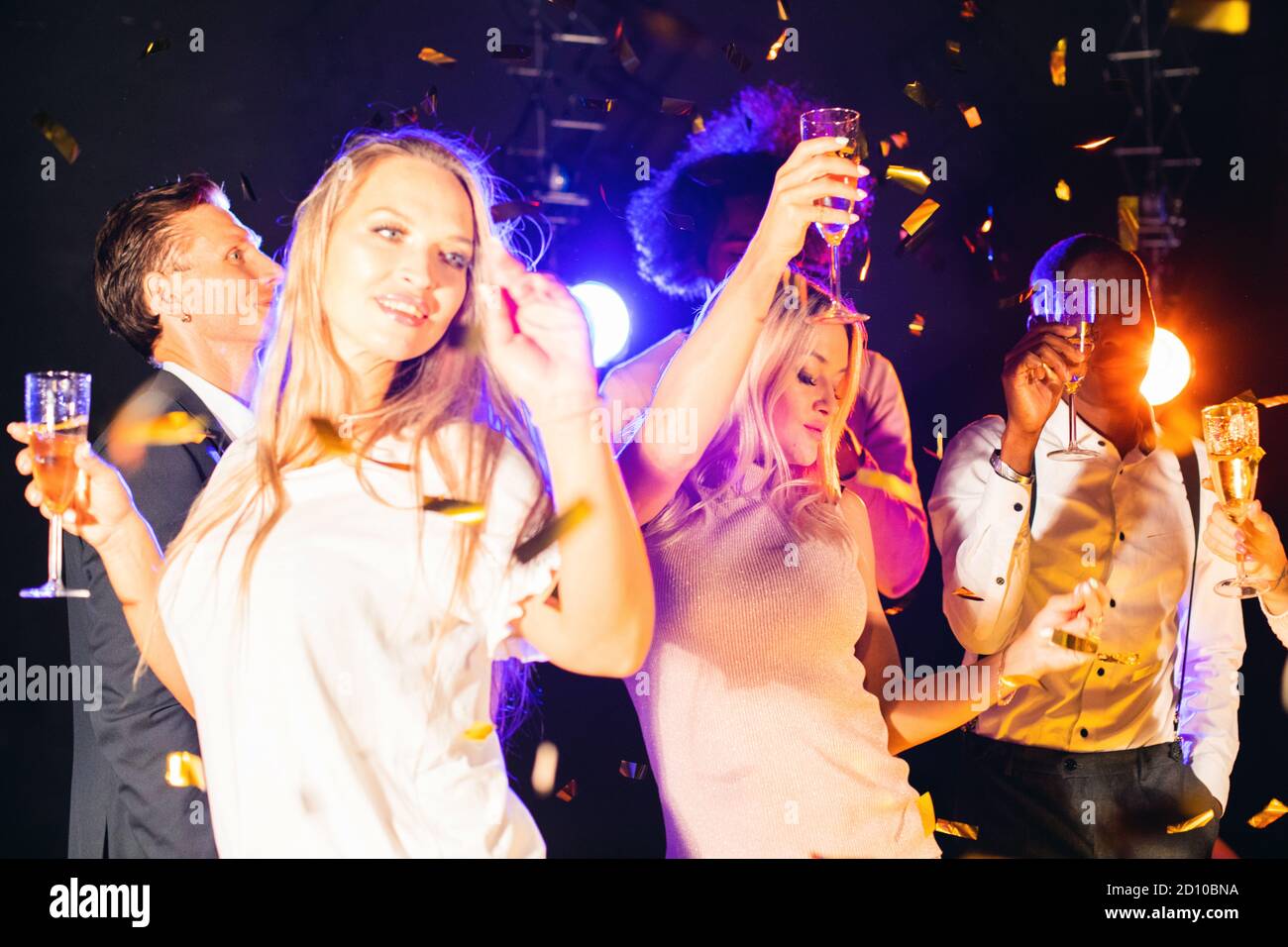 Fashionable women dancing together hi-res stock photography and images ...