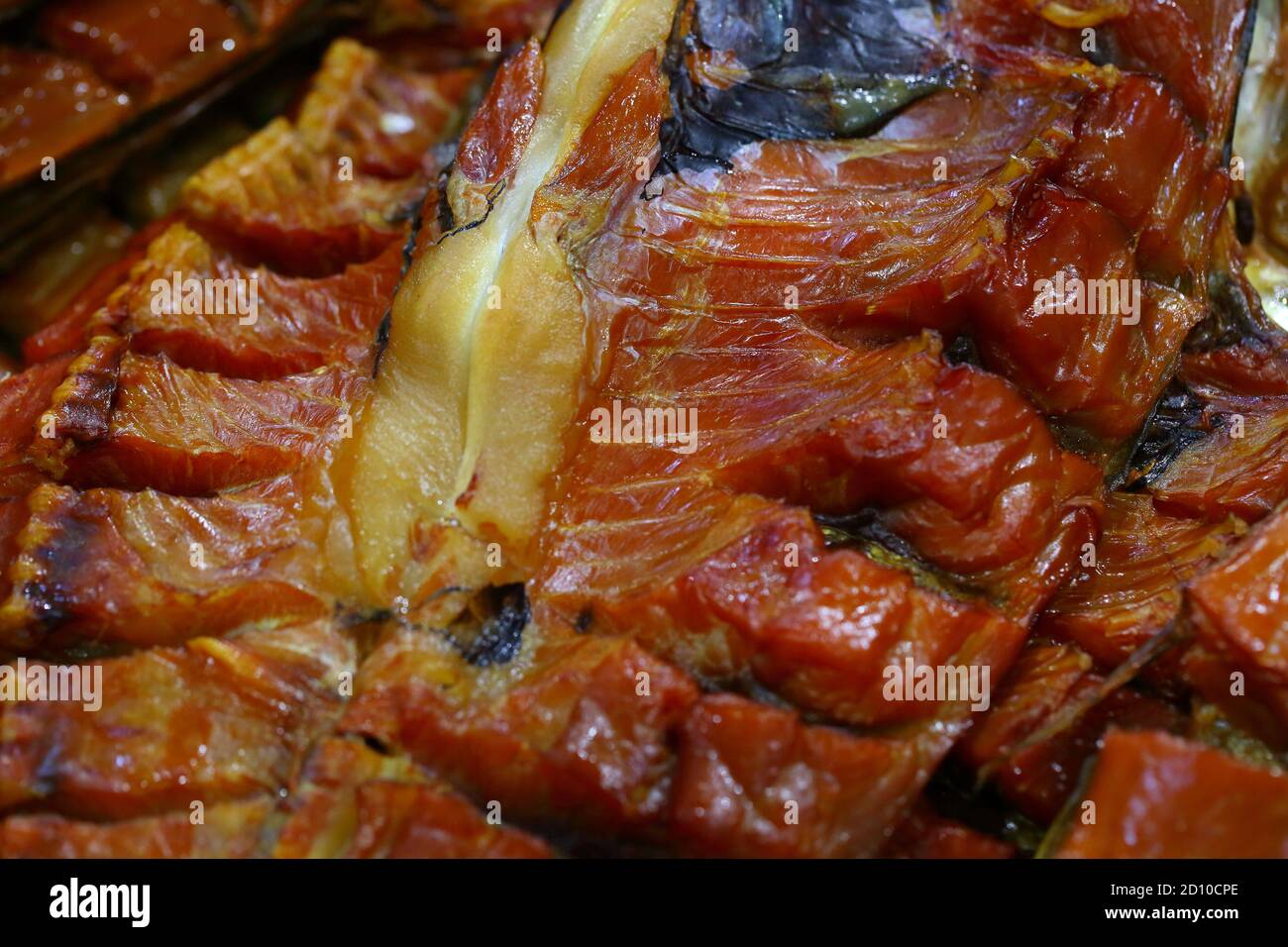 Smoked silver carp on a store counter Stock Photo - Alamy