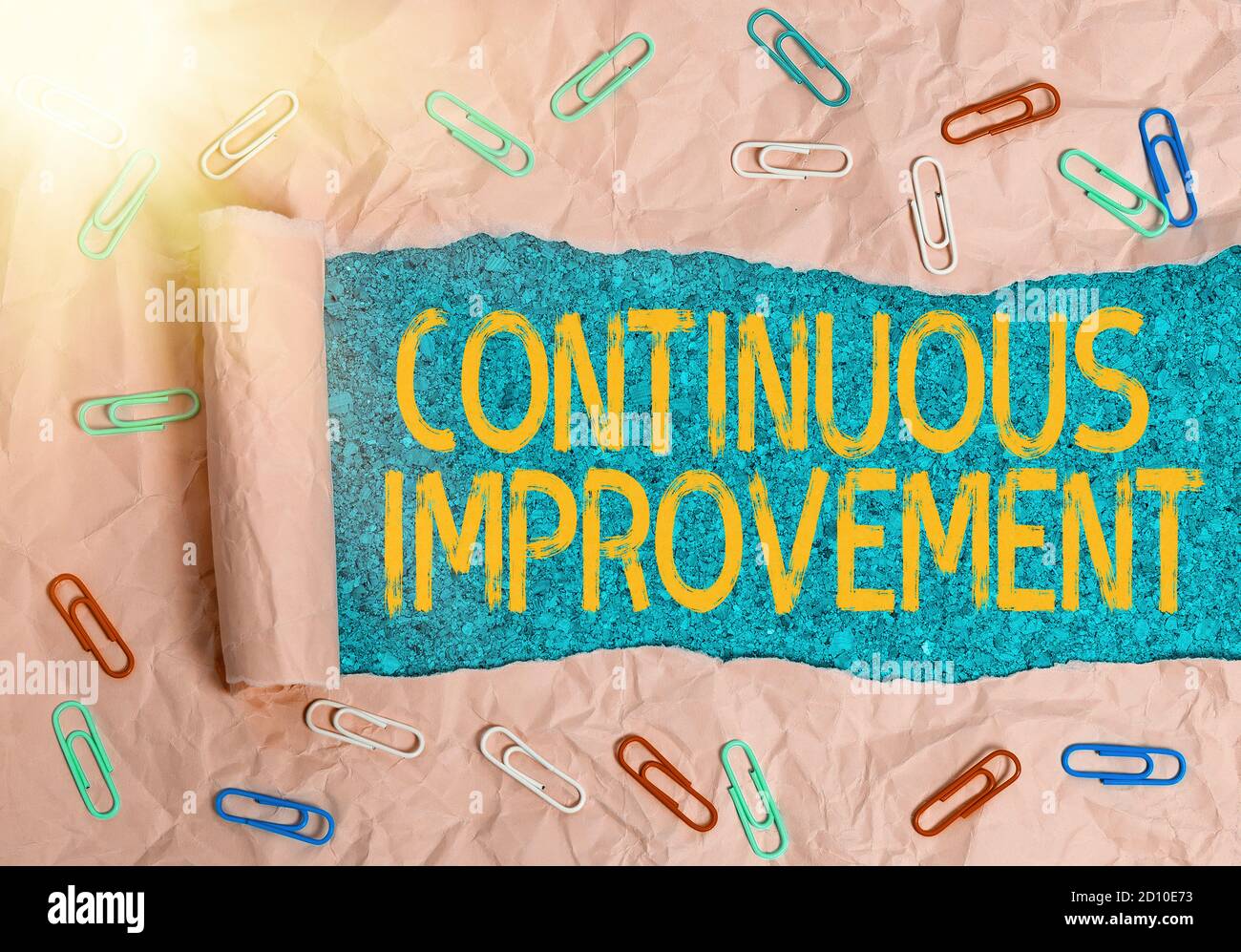 Writing note showing Continuous Improvement. Business concept for ...