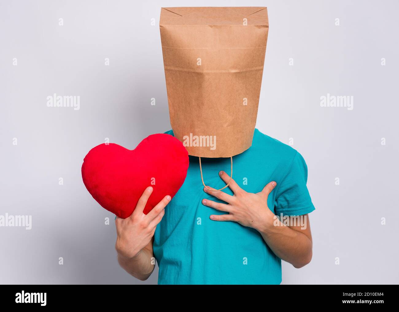 Boy with paper bag over head Stock Photo - Alamy