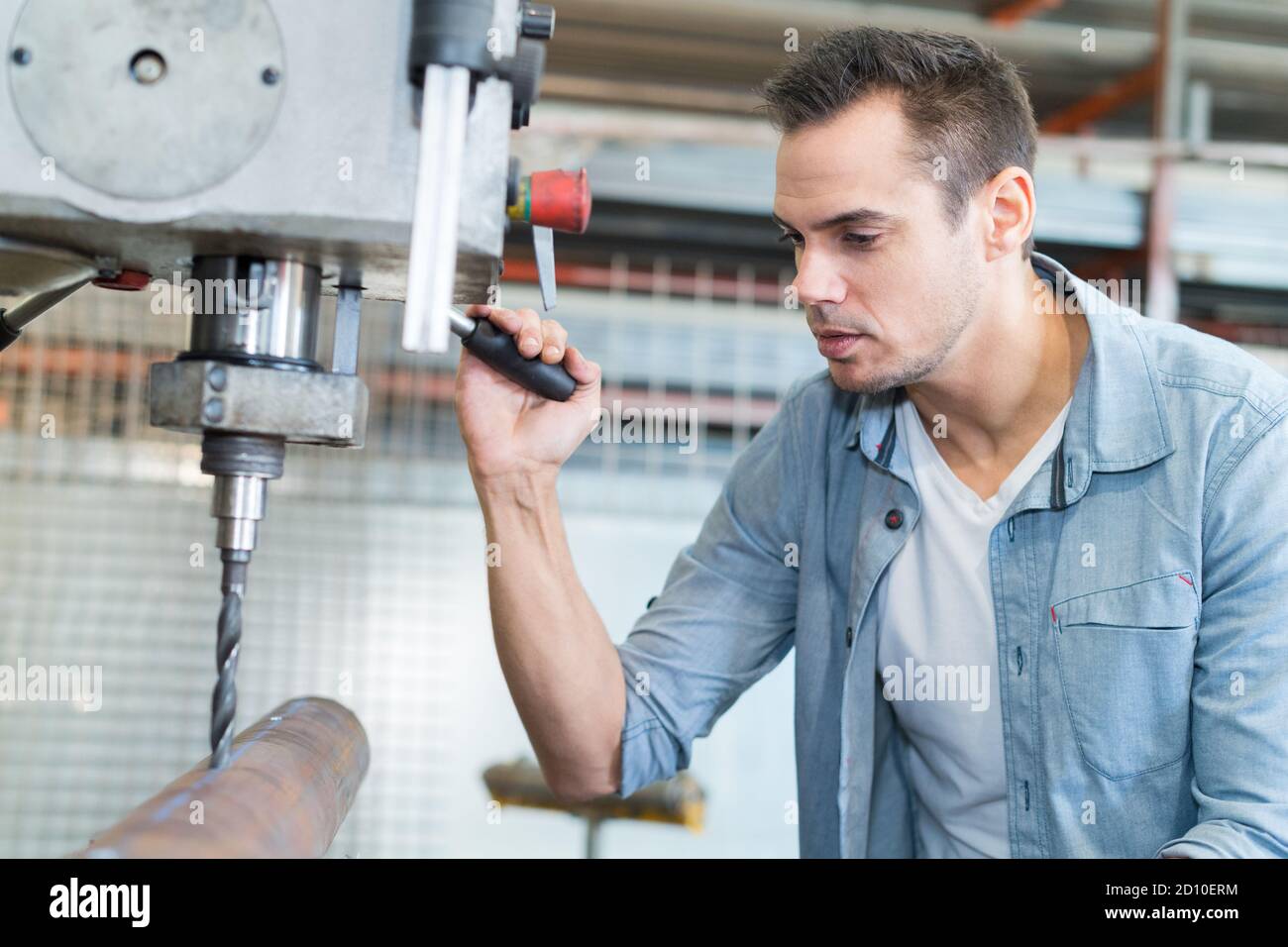 Man woman drill machine hi-res stock photography and images - Alamy