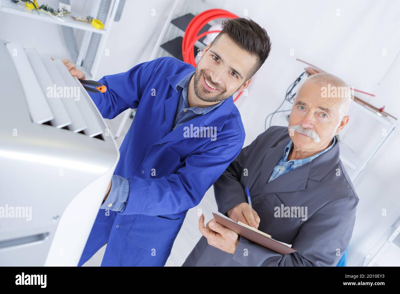 Young handsome technician teacher hi-res stock photography and images ...