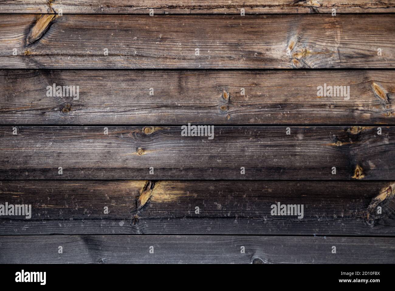 Old, burnt wooden surface - a rustic background Stock Photo - Alamy