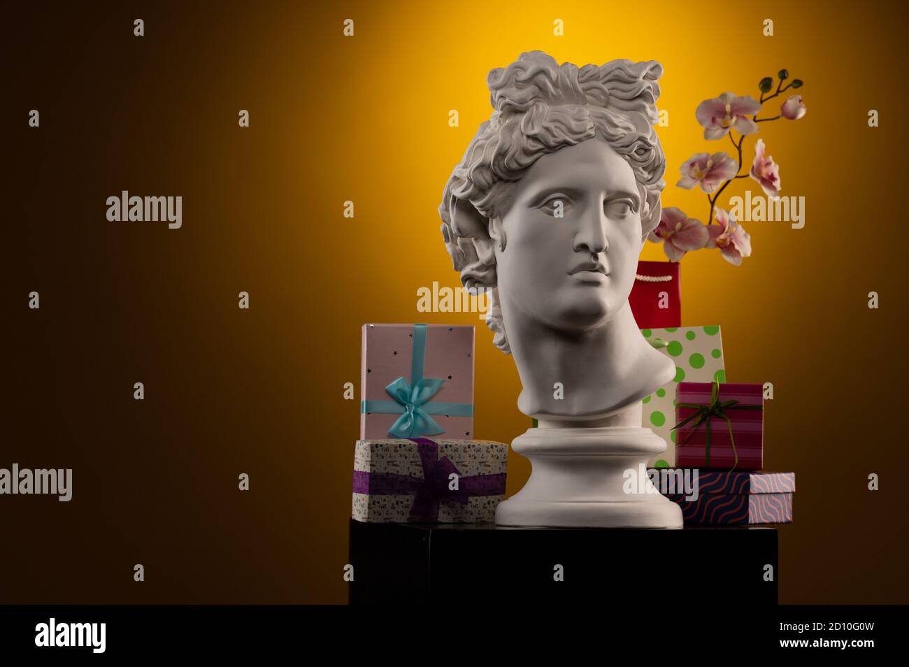 Statue of Apollo Belvedere, flowers and gifts boxes and packages ...