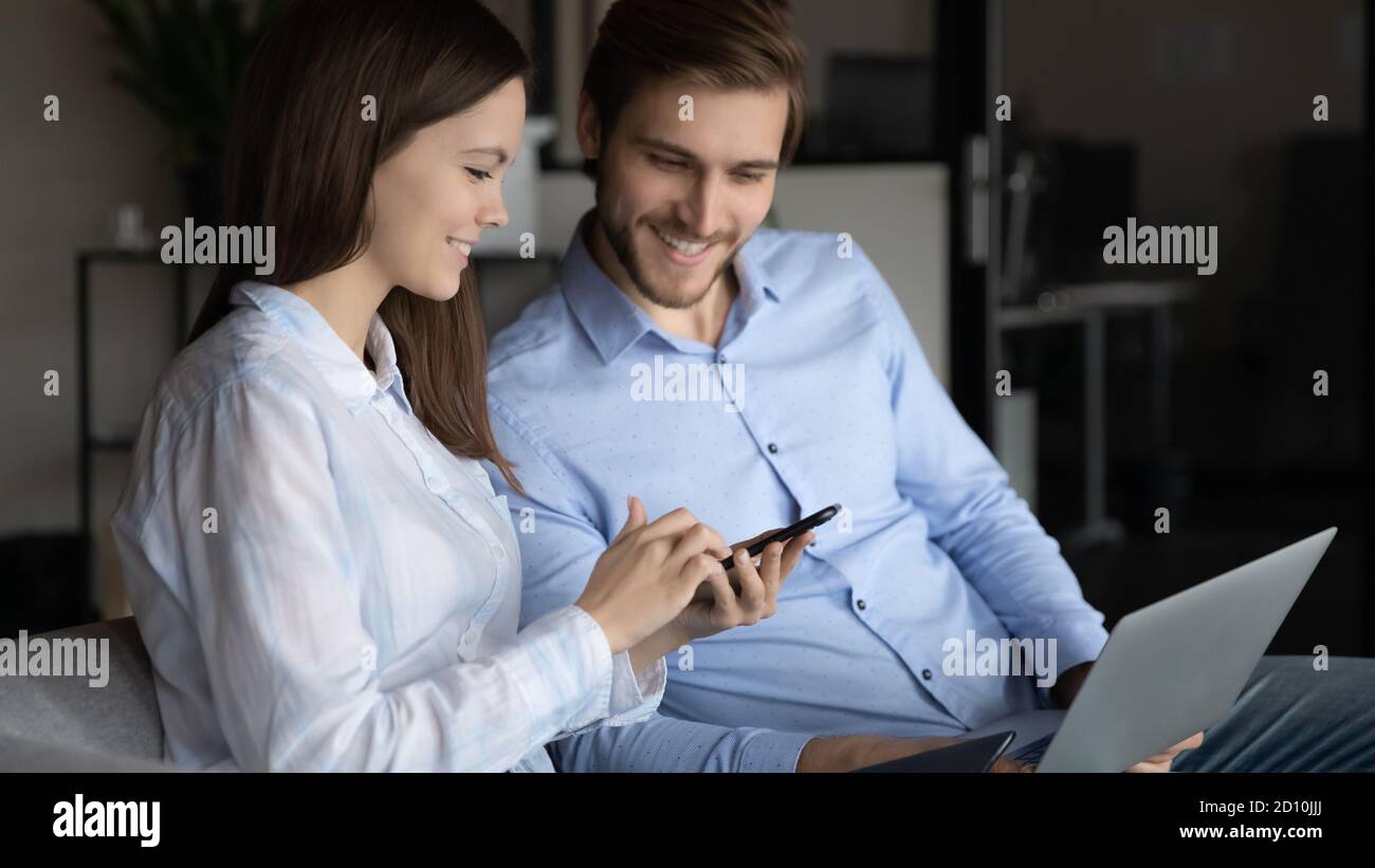 Happy friendly colleagues enjoying break pause time Stock Photo - Alamy
