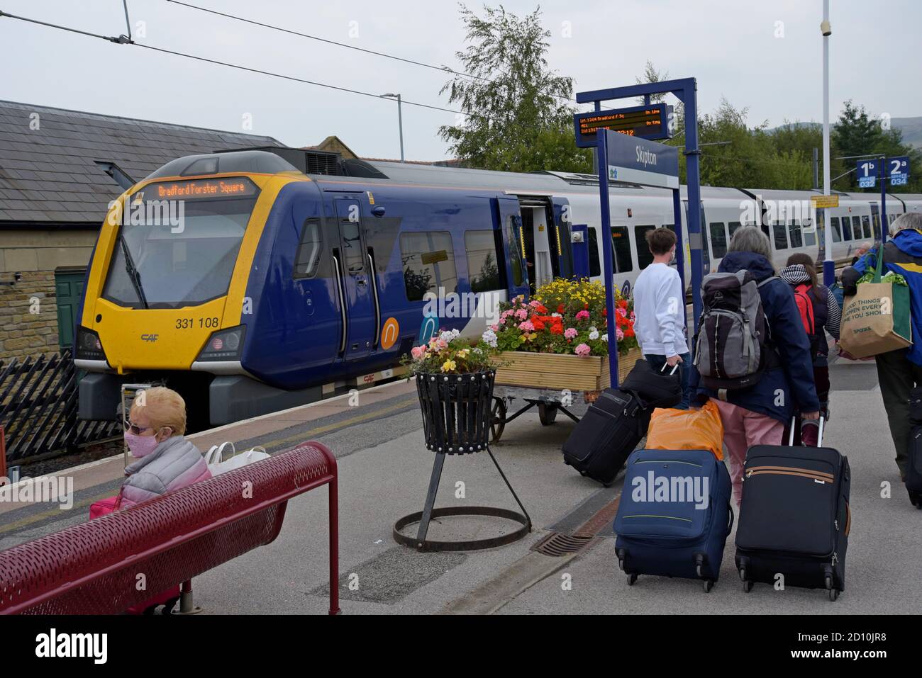 Passengers leaving a new class 331 electric train operated by Northern ...