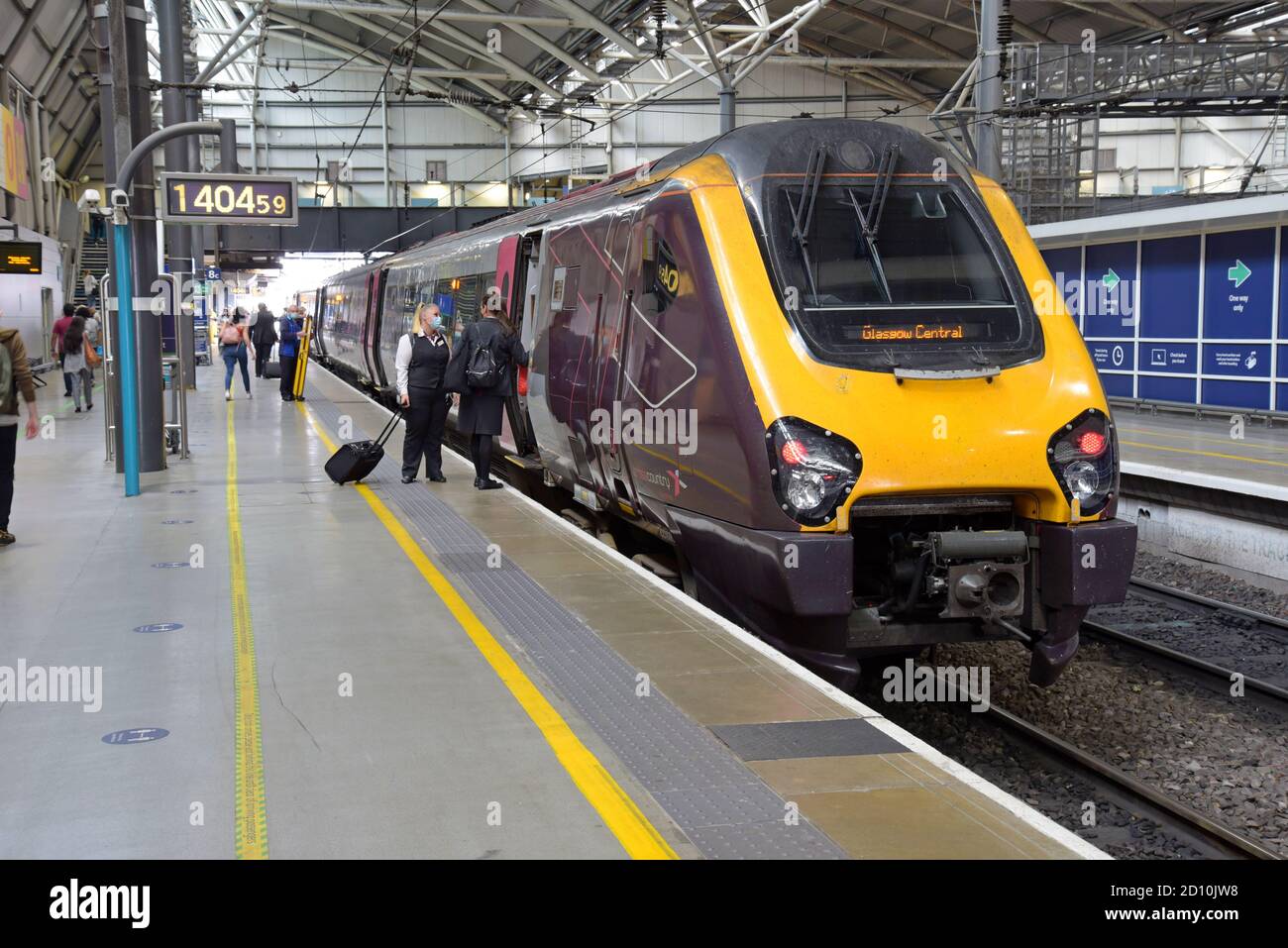 Railway staff wearing face masks getting on board a Cross Country ...