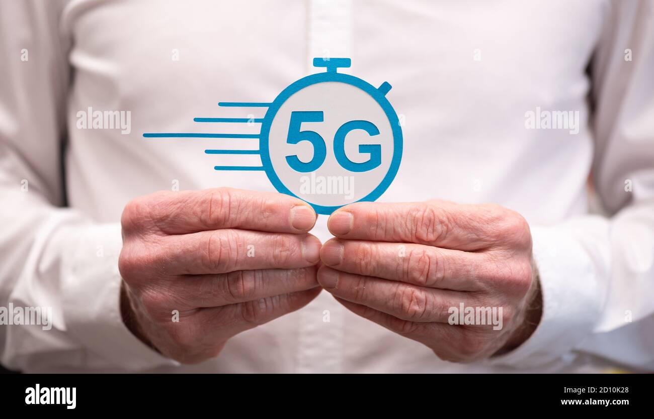 Man holding a 5G sign; Concept of 5G Stock Photo - Alamy
