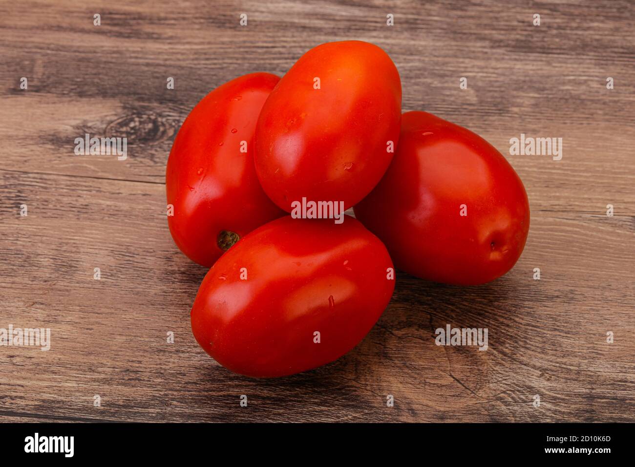 Few Red bright tasty tomato heap Stock Photo - Alamy
