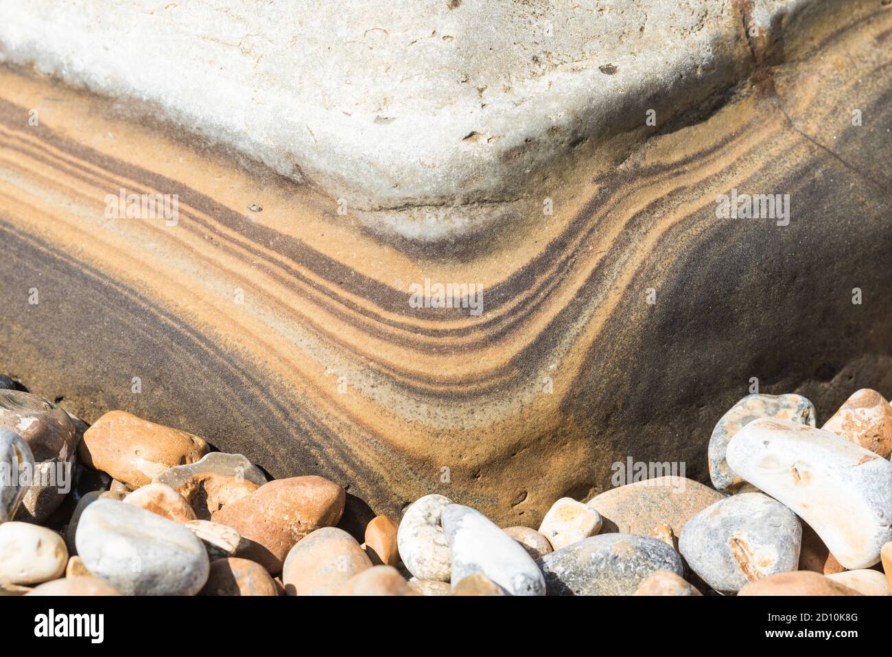 Sandstone boulder from East Cliff, Hastings showing layering Stock ...