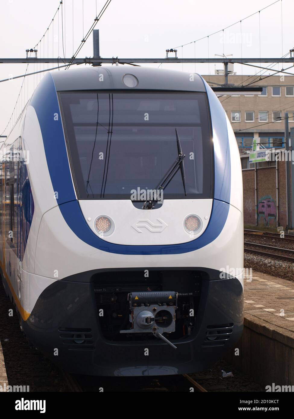 SLT local commuter train at the railroad station of Gouda in the ...