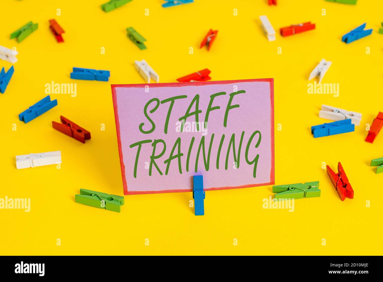 Writing note showing Staff Training. Business concept for program that ...